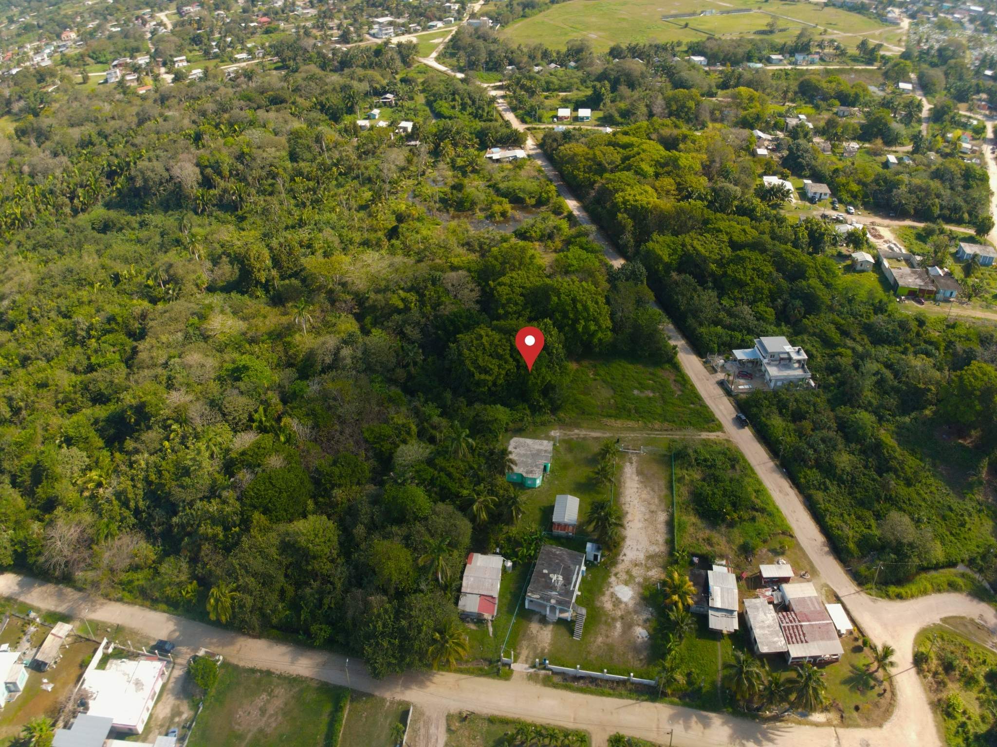 Residential Lot w/ Double Road Frontage in Corozal Town • Vista Real Estate